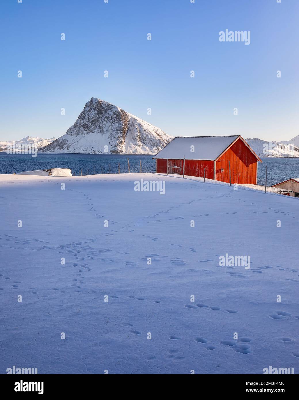 Awesome winter view on Vetvagoy coastline seen from Storsandnes beach ...