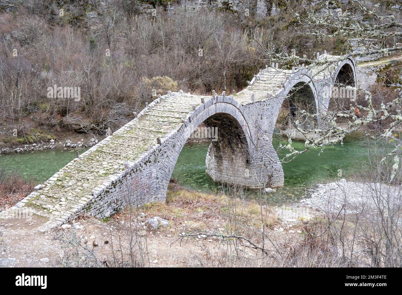 Greece Epirus. Plakida or Kalogeriko ancient three arched stone bridge ...