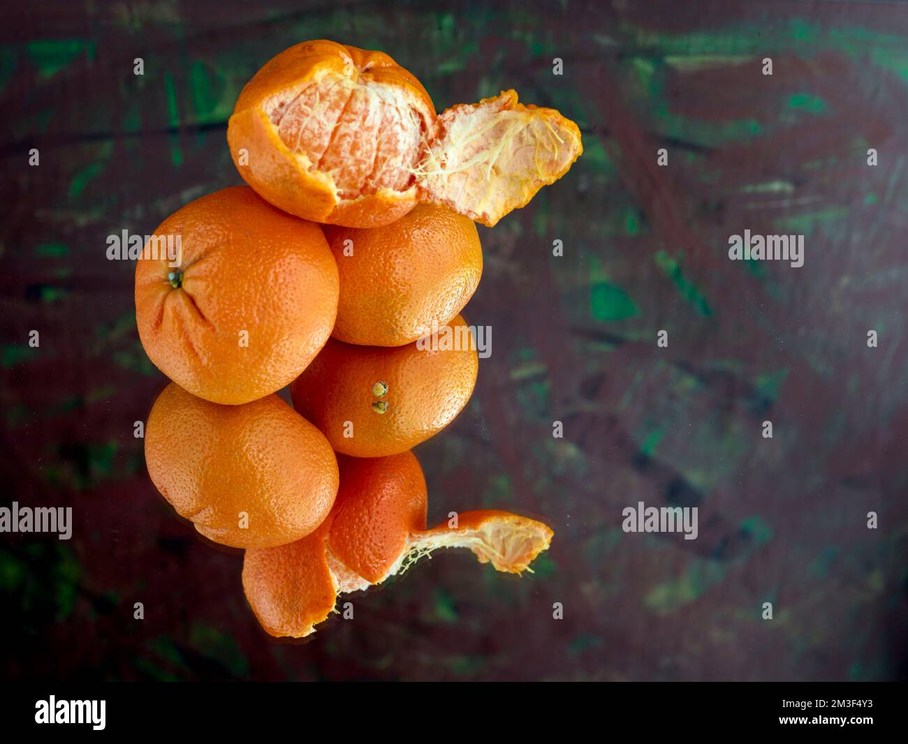 Easy peel sweet Tangerines on clean neutral background. Natural close ...