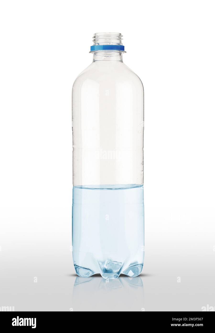 a small bottle half full of water on a white background Stock Photo - Alamy