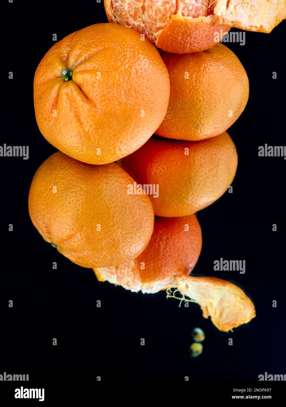 Easy peel sweet Tangerines on clean neutral background. Natural close ...