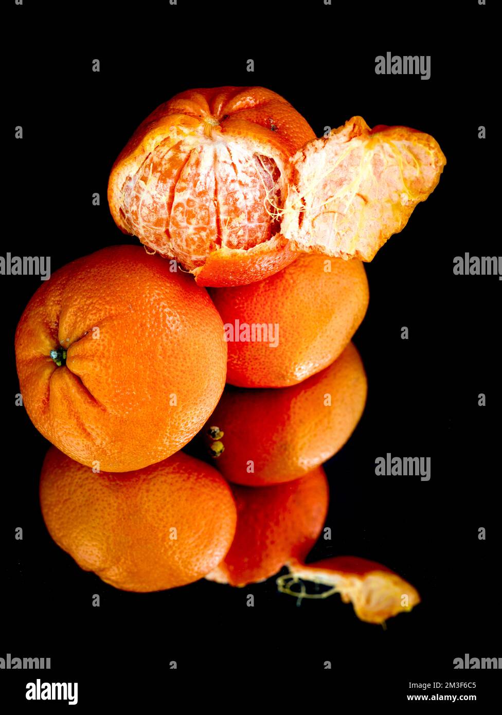 Easy peel sweet Tangerines on clean neutral background. Natural close ...