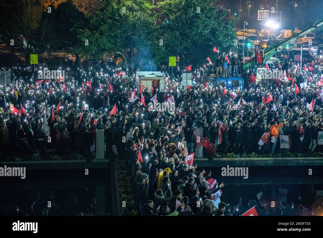 A crowd of citizens with Turkish flags gathers in front of Istanbul ...