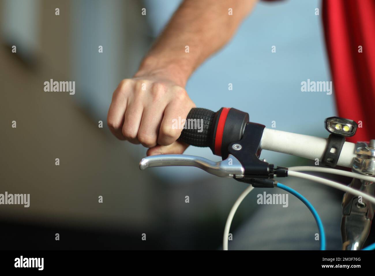 Hands holding handlebar bicycle hi-res stock photography and images - Alamy