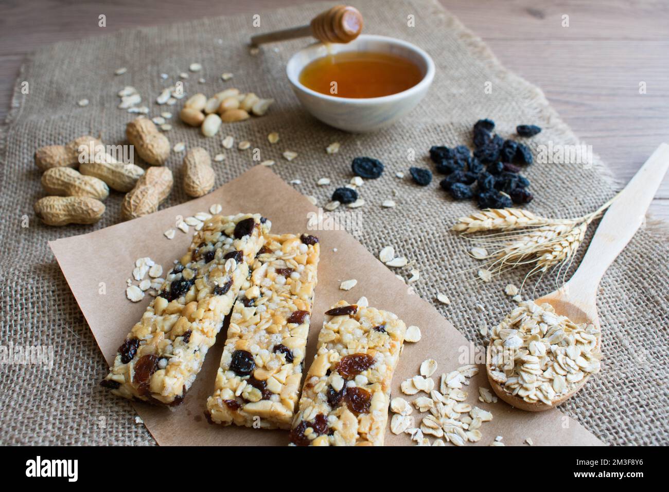 Granola bars, peanuts, oats, honey, grapes, healthy nutrition ...