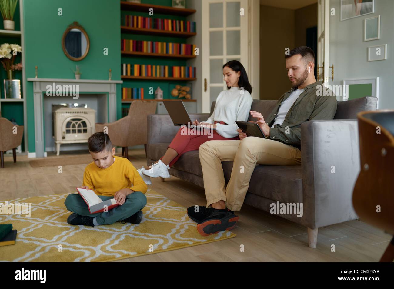 Happy family spending time at home together in evening Stock Photo - Alamy