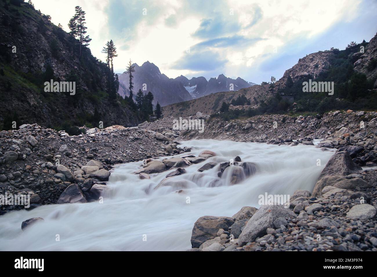 A long exposure of a river in the middle of the valley Stock Photo - Alamy
