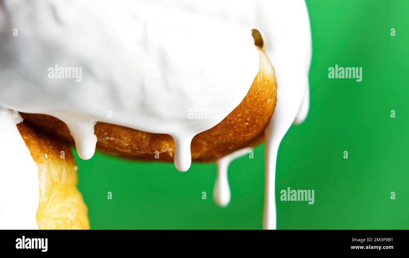 Donuts with dripping white cream. Stock clip. Sweet donuts with liquid ...