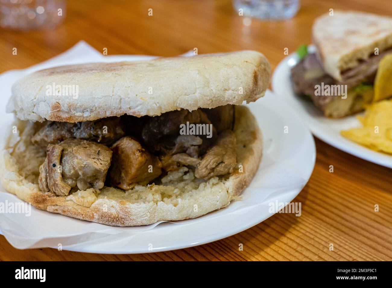 Bolo do caco is a circular Madeiran flatbread, shaped like a cake and ...