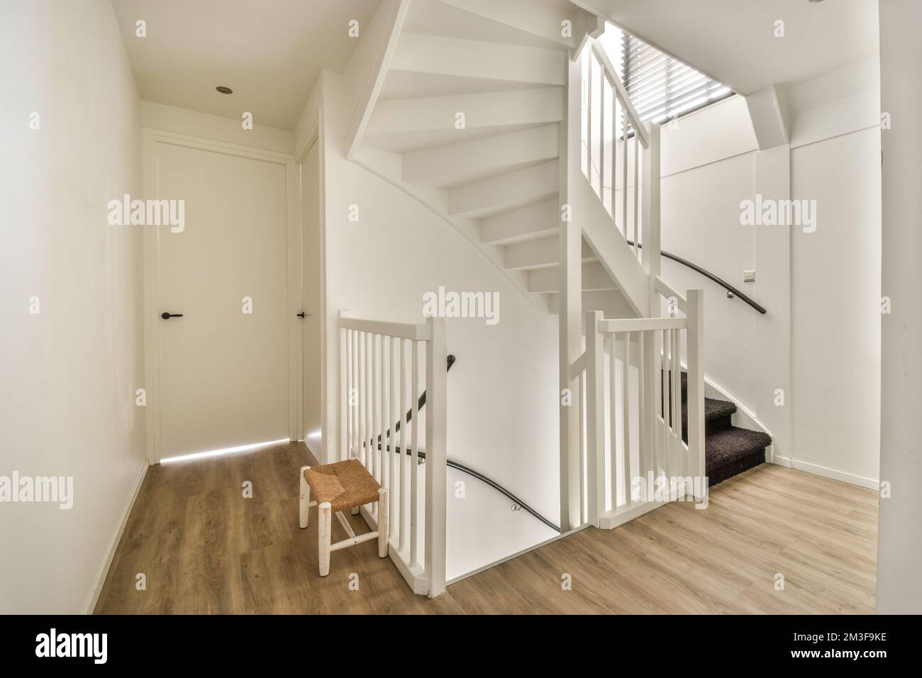 Narrow staircase railing hi-res stock photography and images - Alamy