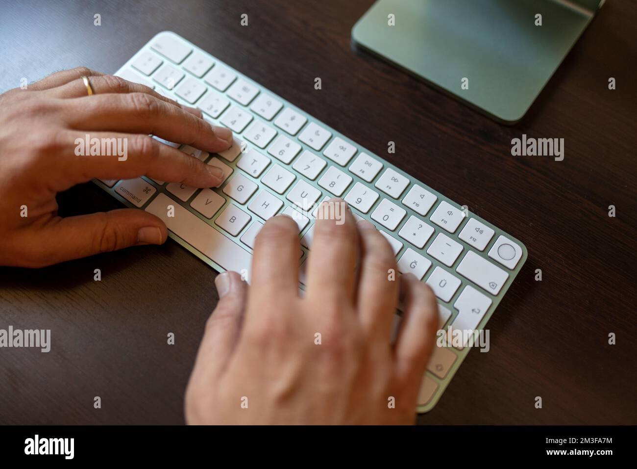 Hands typing on computer keyboard. man hands on the keyboard Working at ...