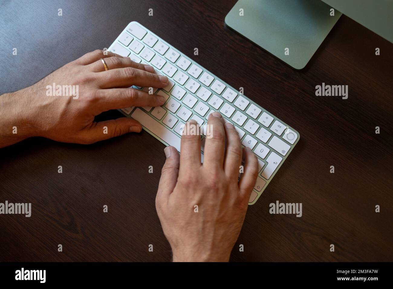 Hands typing on computer keyboard. man hands on the keyboard Working at ...