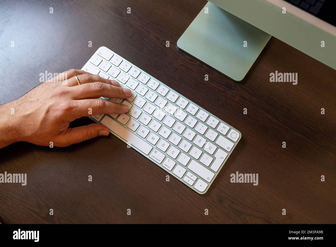 Hands typing on computer keyboard. man hands on the keyboard Working at ...
