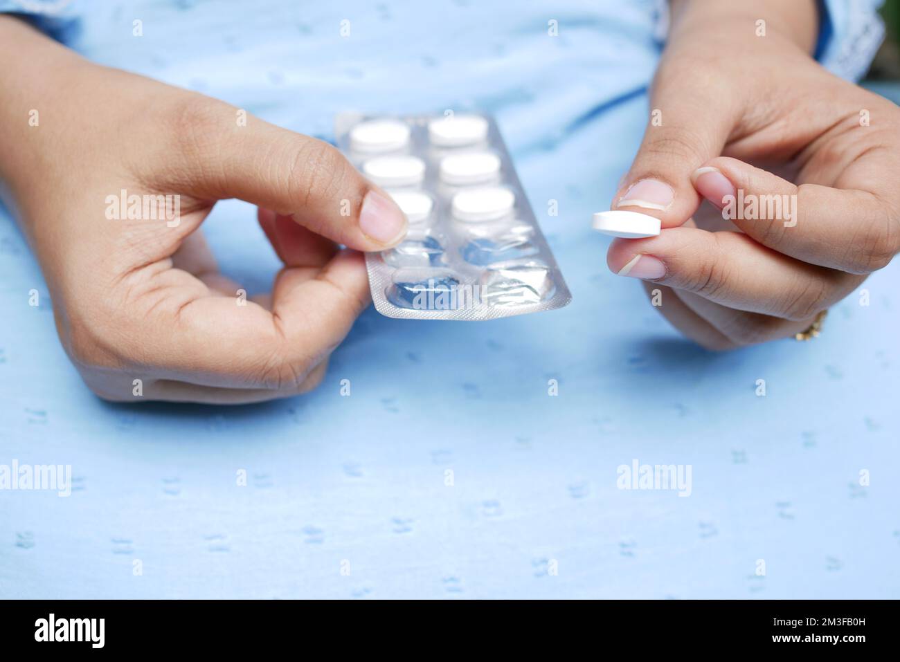 Women hand holding blister packs hi-res stock photography and images ...