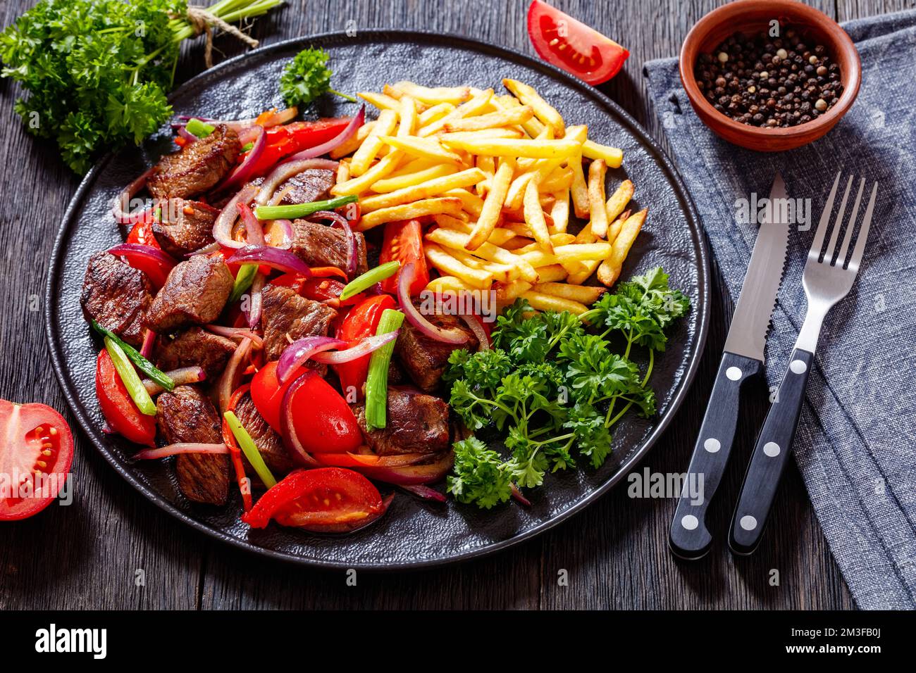Lomo saltado, Peruvian dish of stir-fried slices of beef sirloin ...