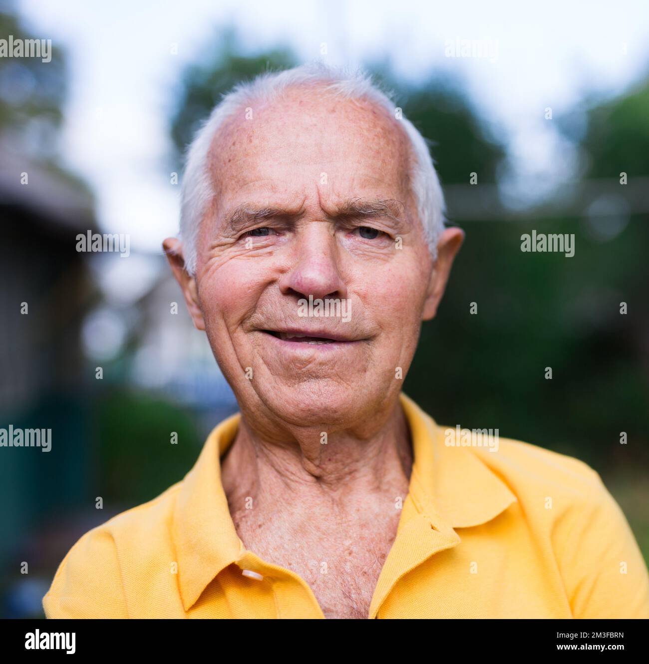 Portrait of positive old man Stock Photo - Alamy