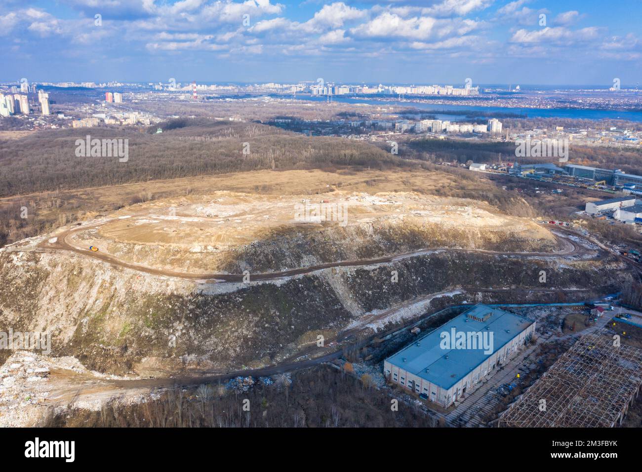Huge household waste dump next to a three-story building: huge ...