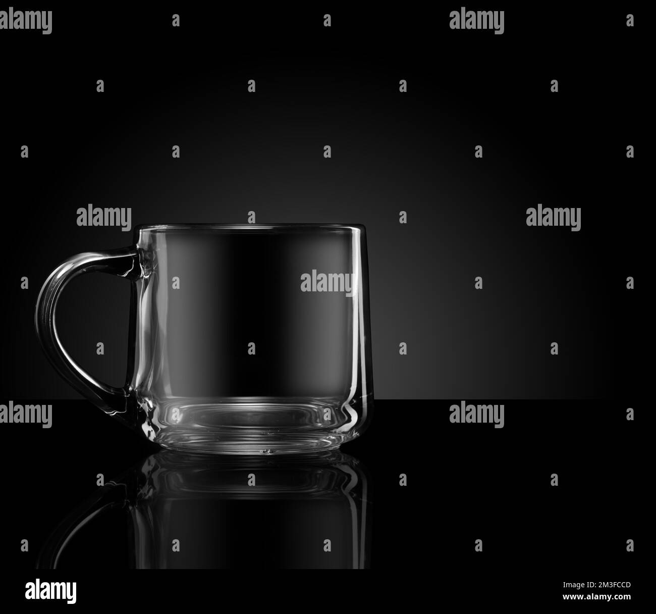 empty tea mug on a black background with mirror reflection Stock Photo ...