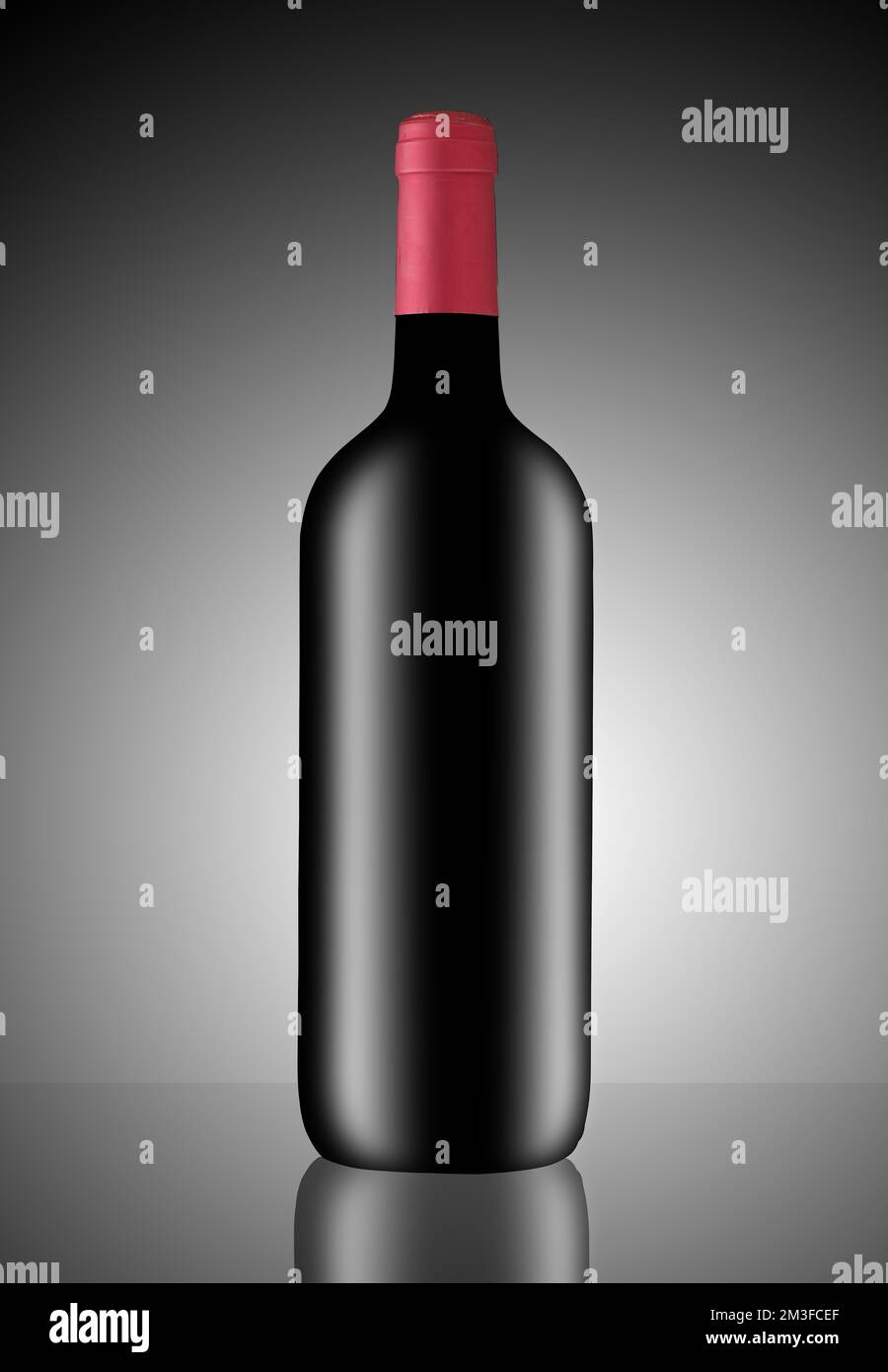 dark wine bottle on gray background with gradient Stock Photo - Alamy