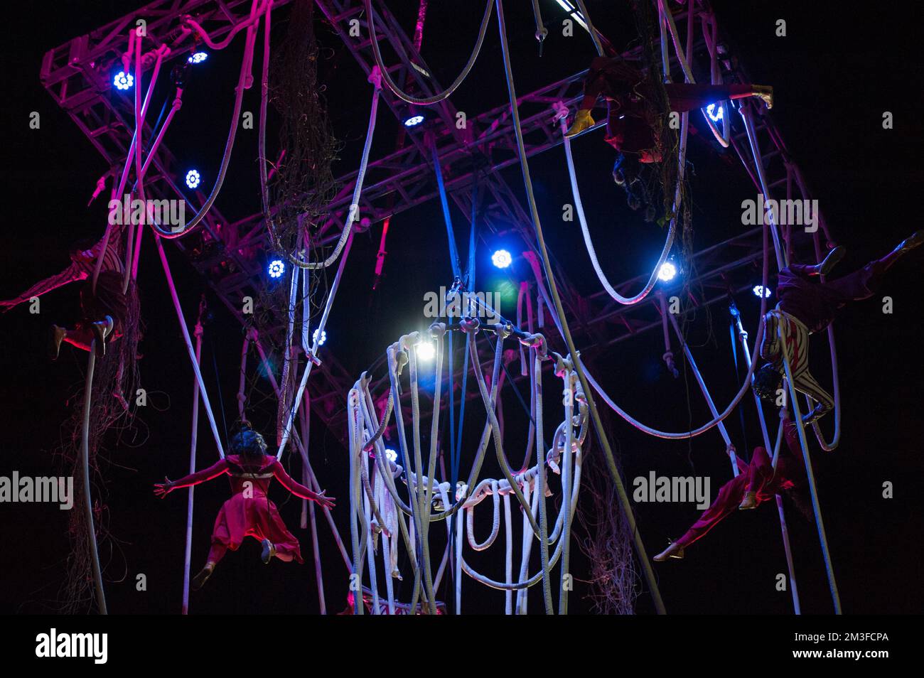 Actors hang from a crane during the Christmas play 'The tree of ...