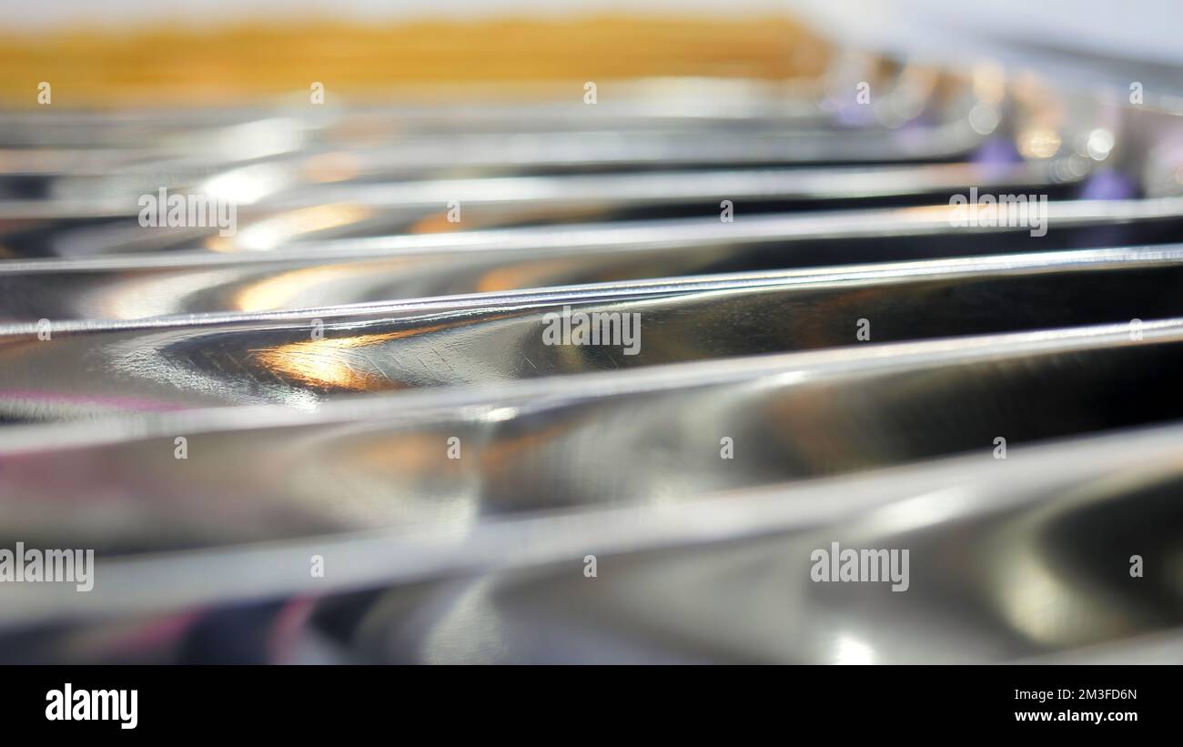 Close-up of metal grid of generator. Media. Lines of steel grid in ...