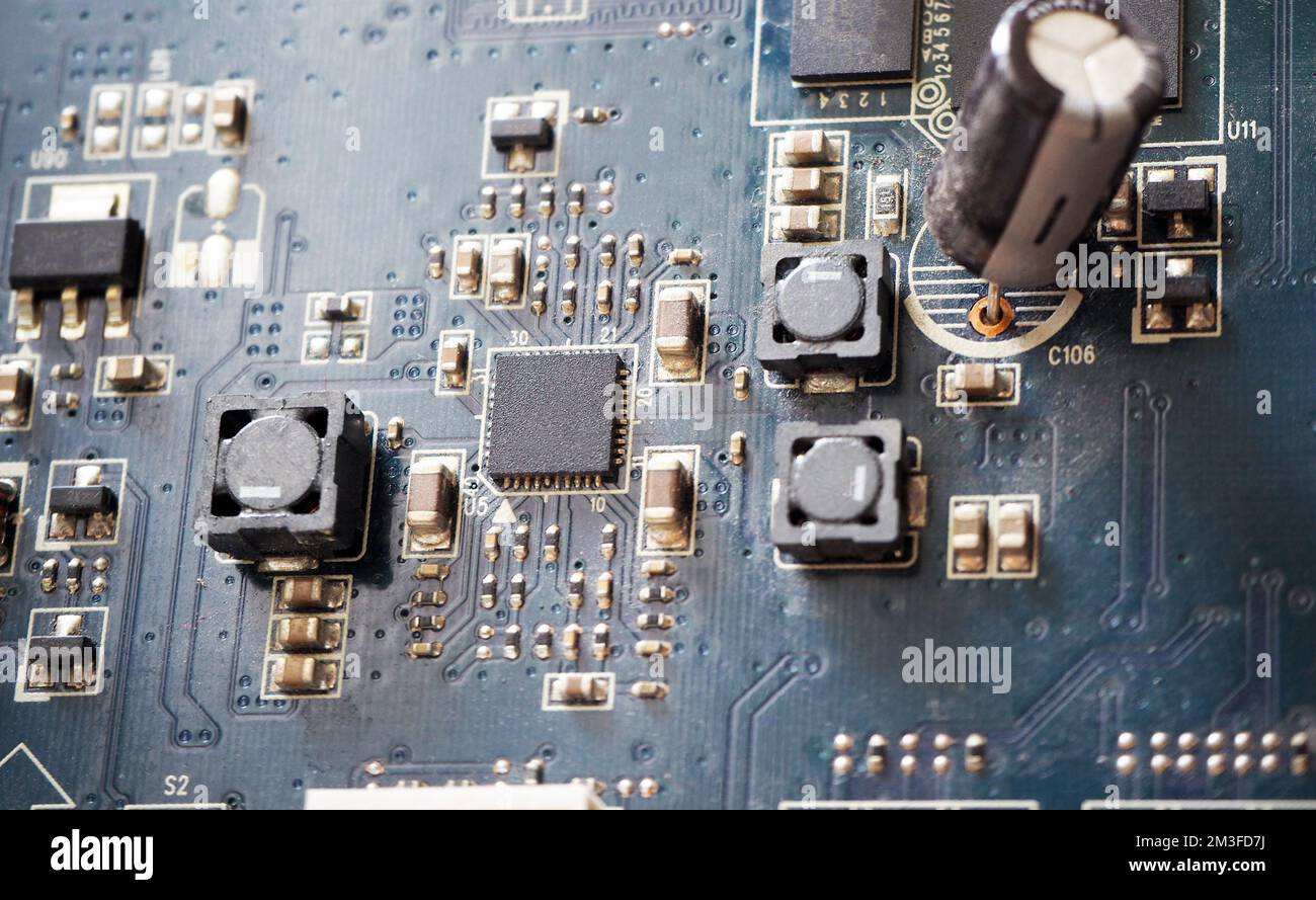 Close-up of electronic circuit board. Microchip consept background ...