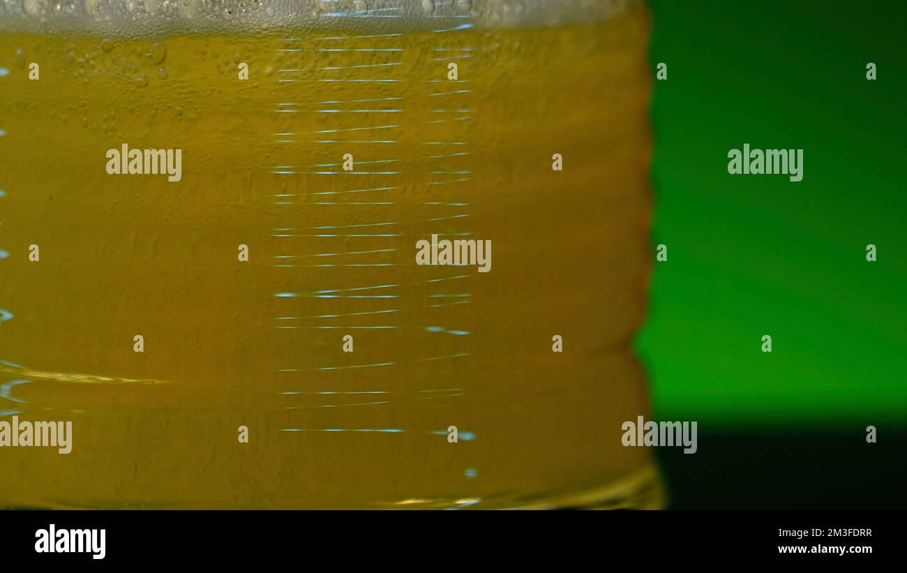Close up of an alcoholic drink in transparent glass. Stock clip ...