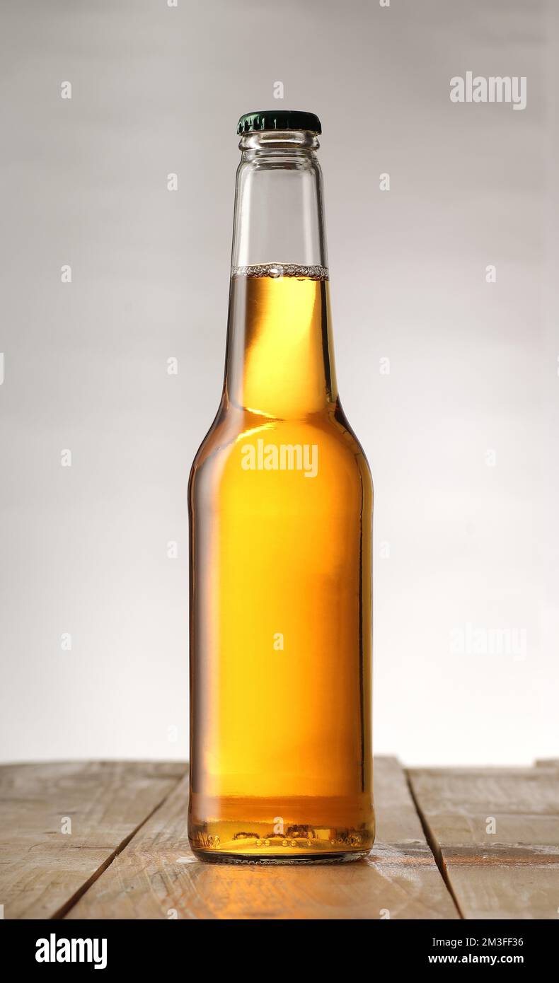 full bottle of light beer on a white background Stock Photo - Alamy