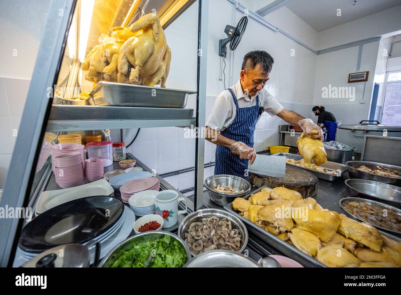 Kota Kinabalu, Malaysia. 3rd Dec, 2022. Andrew Wong Hin Hau prepares ...