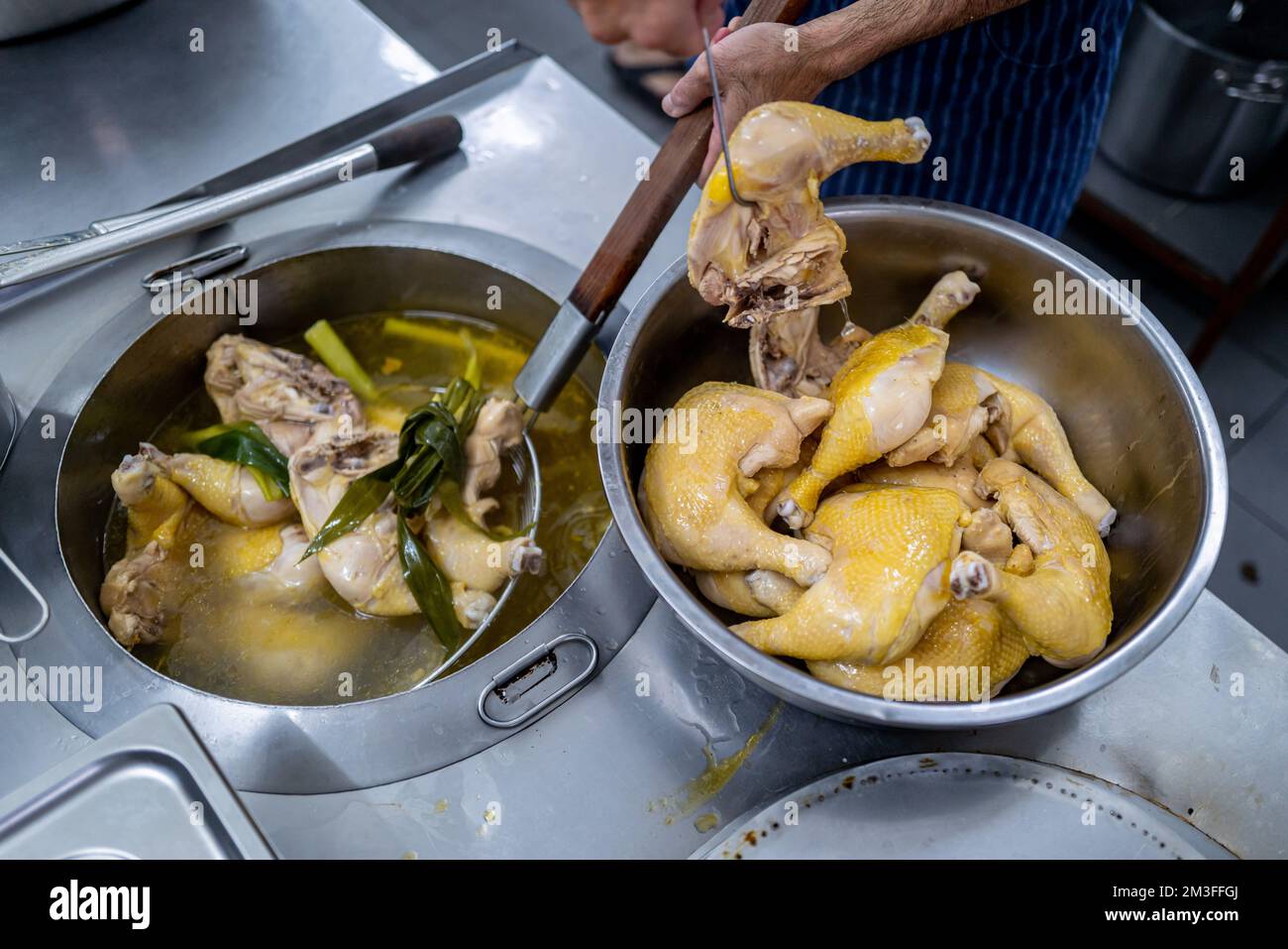 Kota Kinabalu, Malaysia. 3rd Dec, 2022. Andrew Wong Hin Hau prepares ...