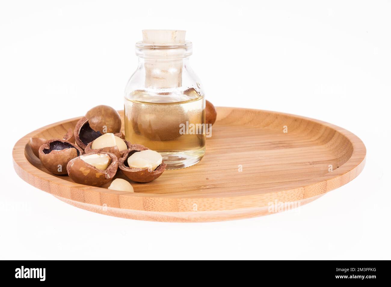 Macadamia nuts oil or Australian walnuts on white background Stock ...
