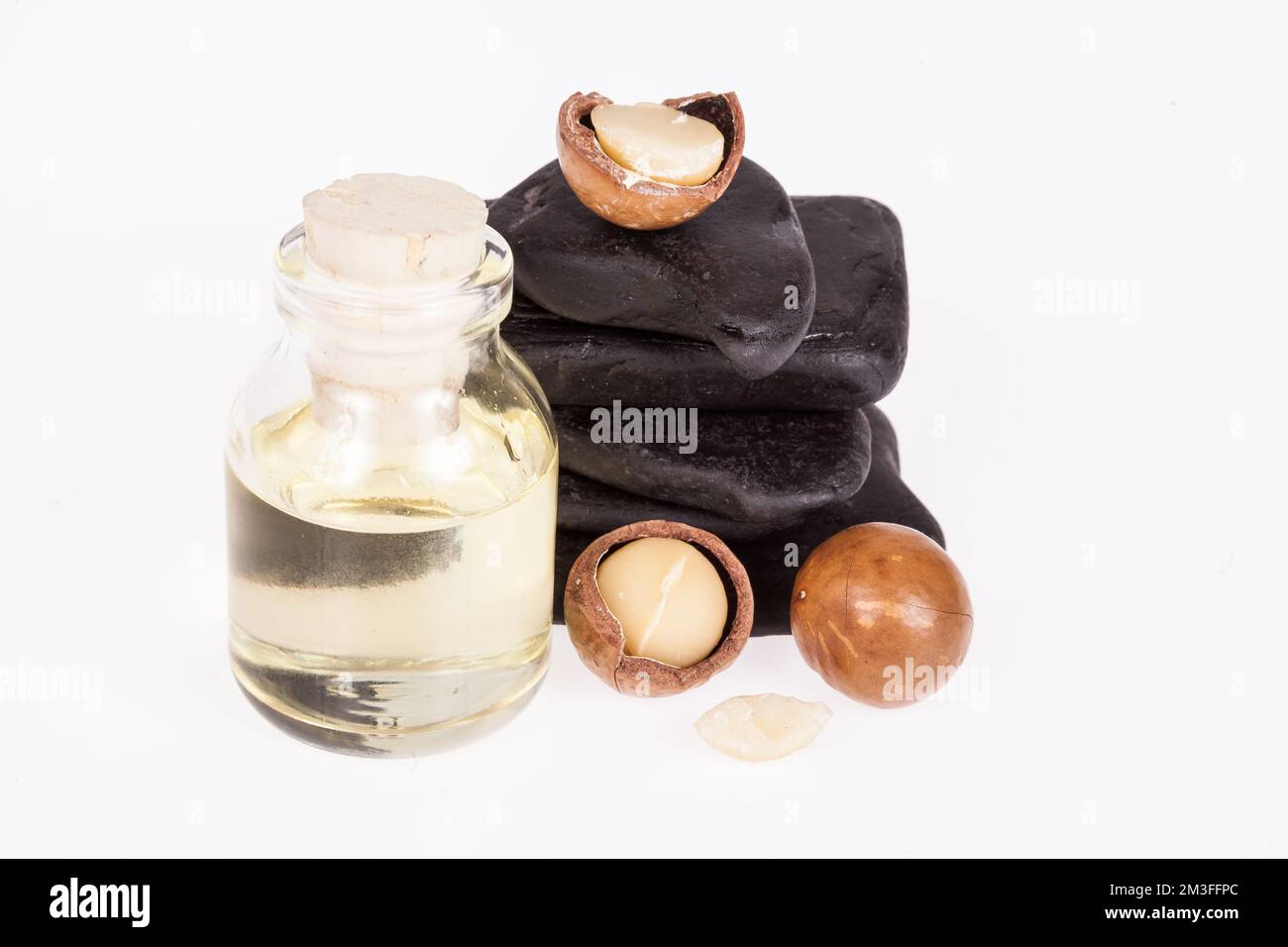 Macadamia nuts oil or Australian walnuts on white background Stock ...