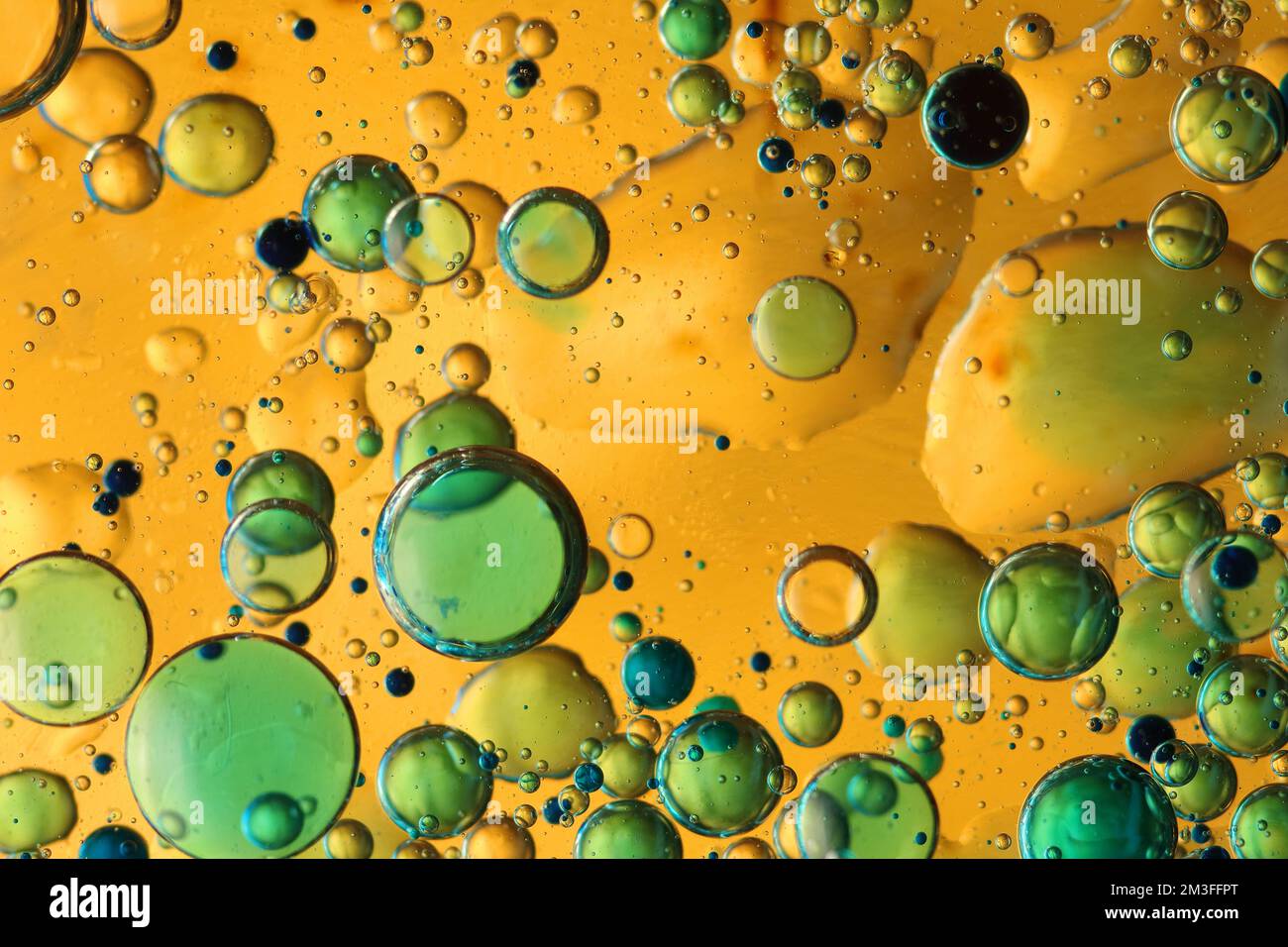 oil bubbles on glass and colored background Stock Photo - Alamy