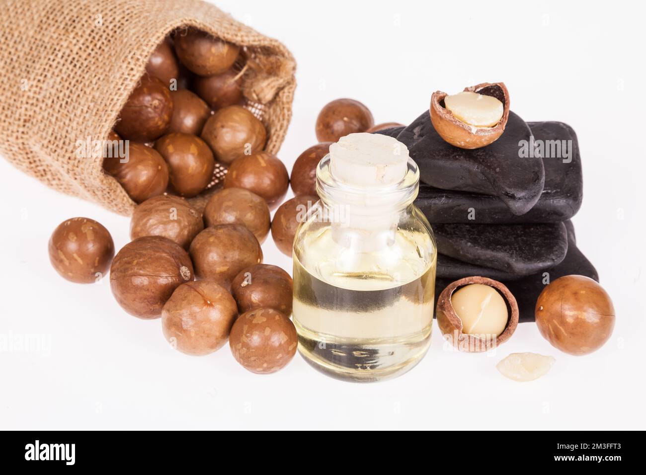 Macadamia nuts oil or Australian walnuts on white background Stock ...