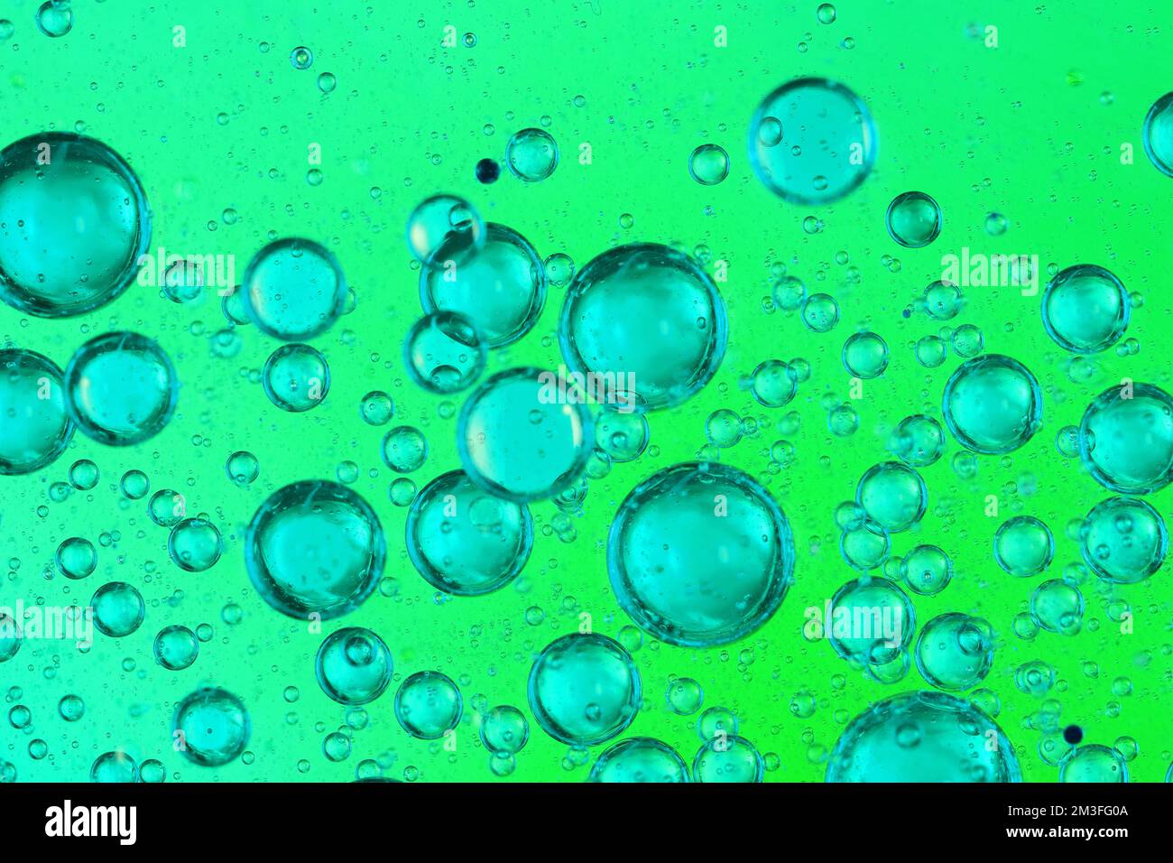 oil bubbles on glass and colored background Stock Photo - Alamy