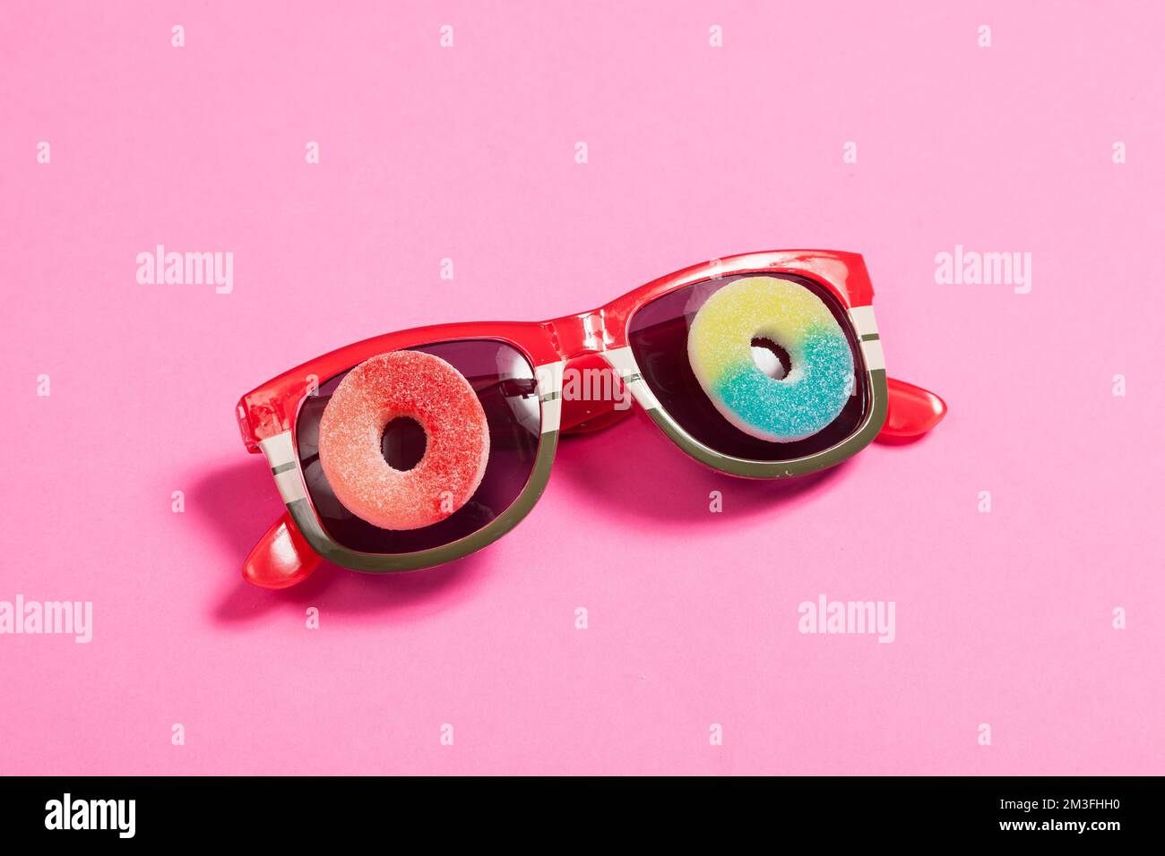 Funny Photo; Eyeglasses With Jelly Beans On The Lenses Stock Photo - Alamy