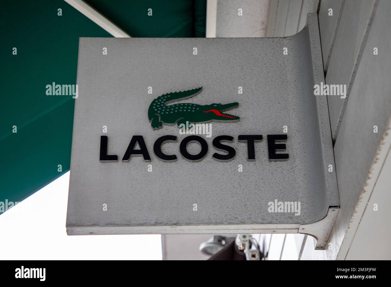 Bordeaux , Aquitaine France - 10 30 2022 : Lacoste brand logo facade ...