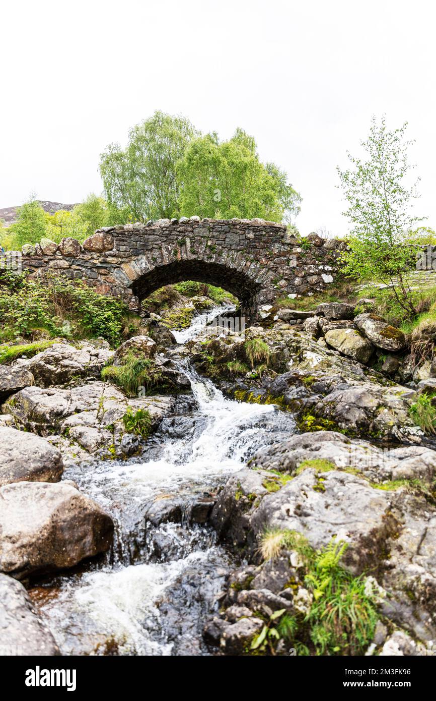 Barrow beck flowing under ashness bridge hi-res stock photography and ...