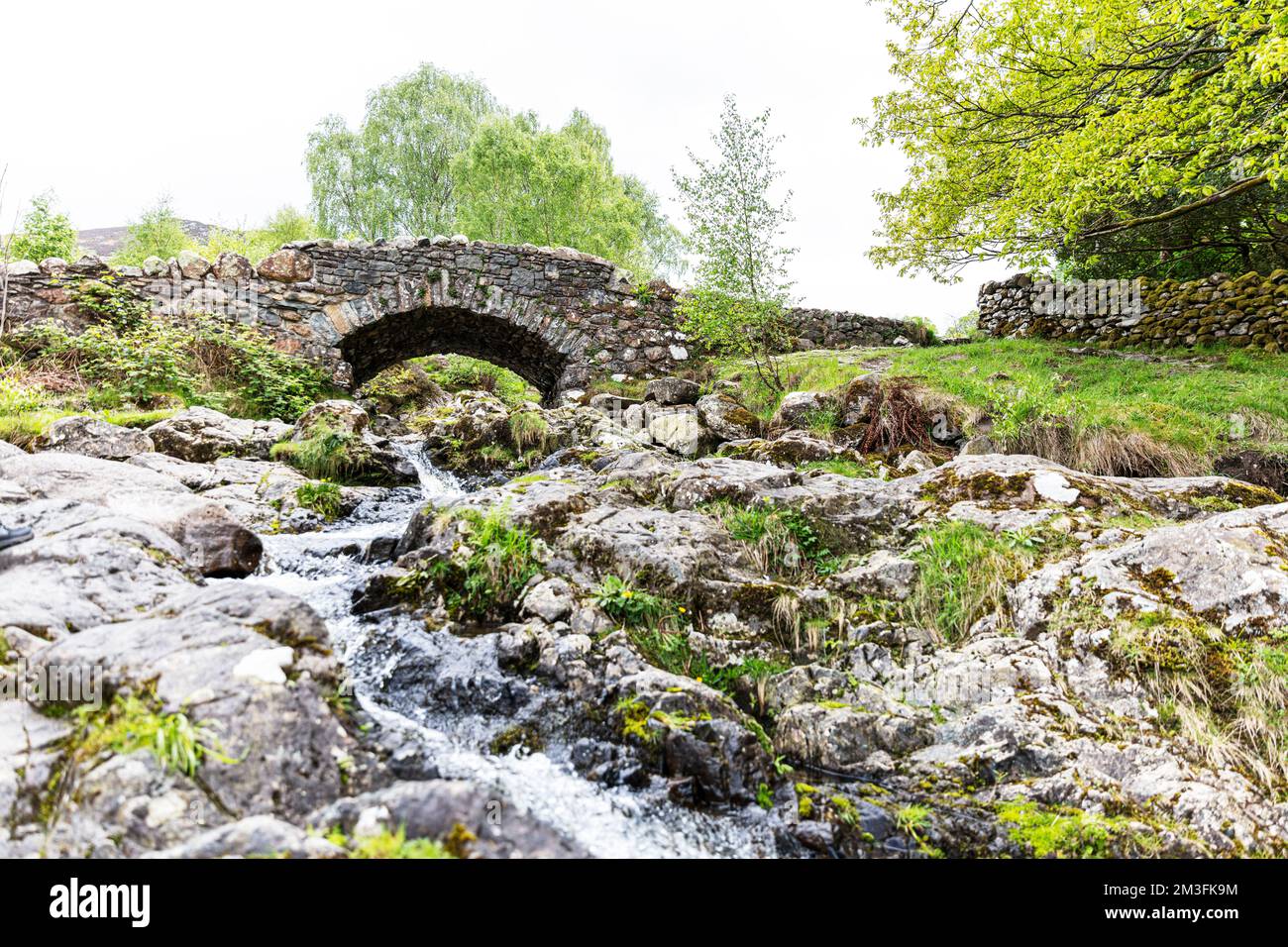 Barrow beck flowing under ashness bridge hi-res stock photography and ...
