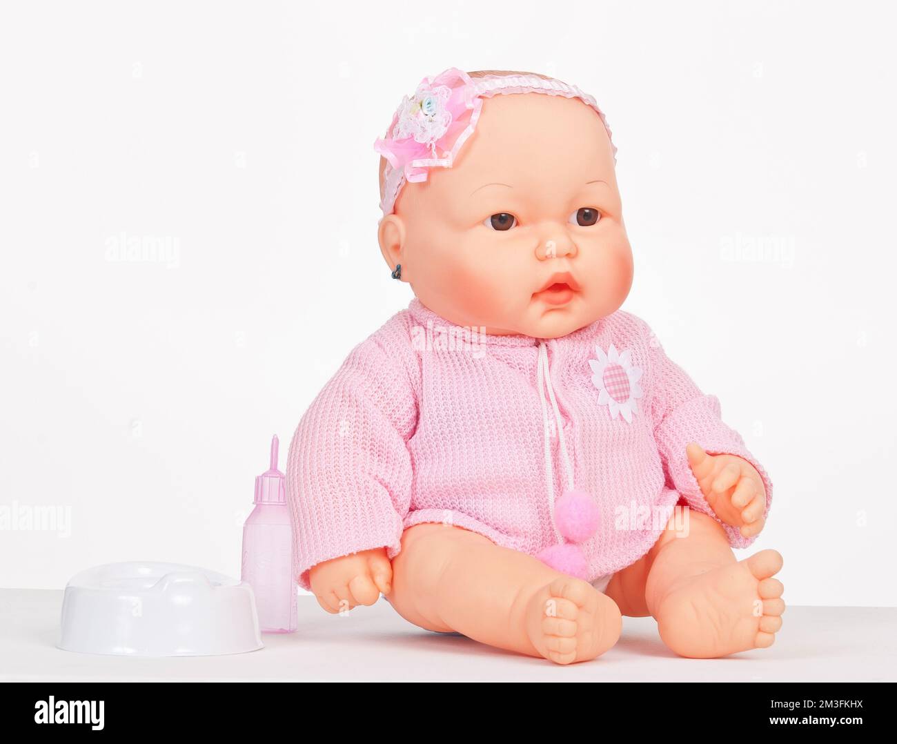 Doll toy in white background Stock Photo - Alamy