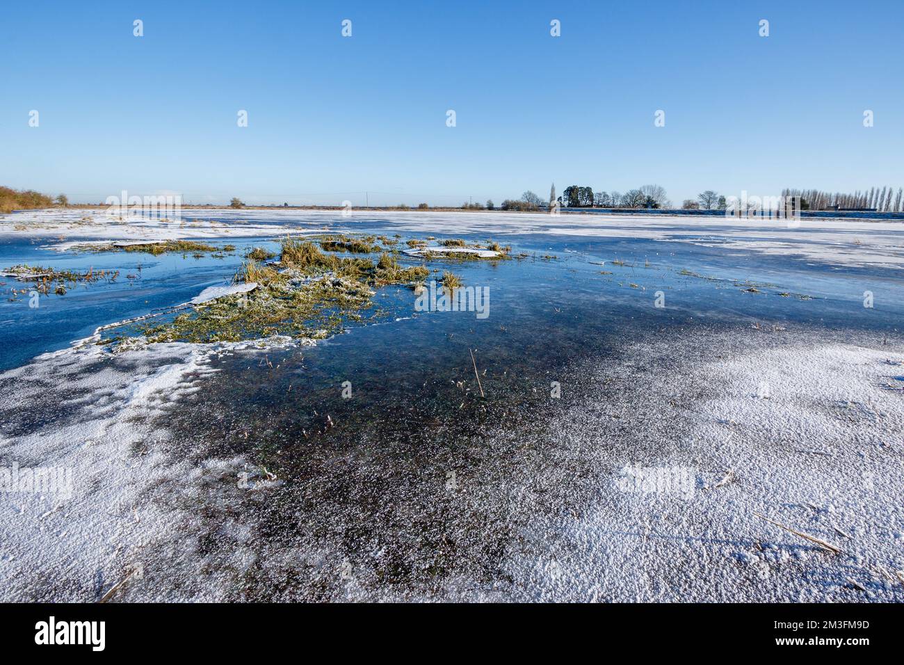 Welney, England. 15 December, 2022. The frozen Welney Washes in Norfolk ...