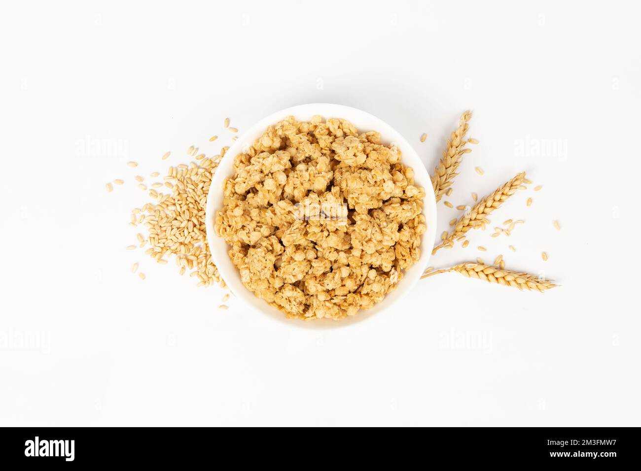 wheat spike next to bowl of corn flakes Stock Photo - Alamy