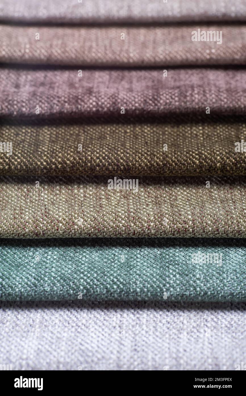 Bright collection of colorful textile samples. Fabric swatches, set in ...