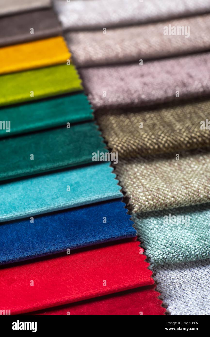 Bright collection of colorful textile samples. Fabric swatches, set in ...