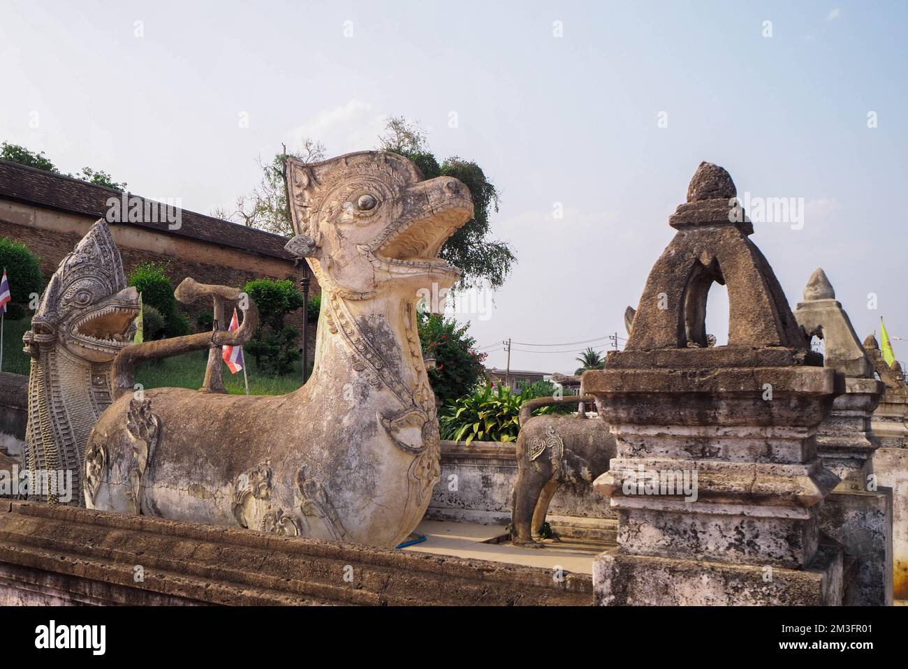 Legendary Buddhist animal statues at temples in Thailand Stock Photo ...