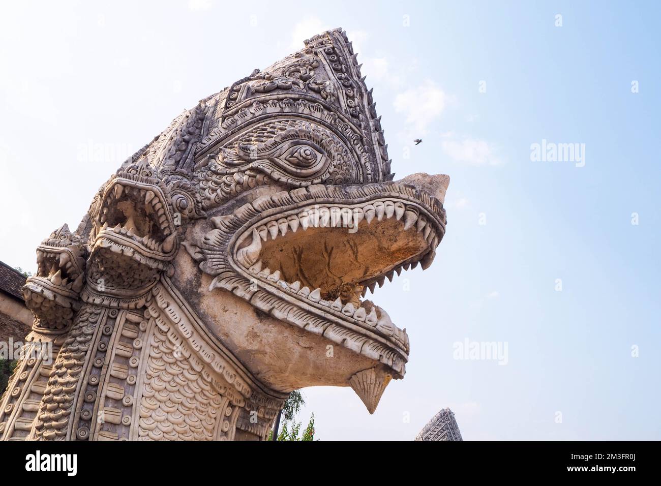Legendary Buddhist animal statues at temples in Thailand Stock Photo ...