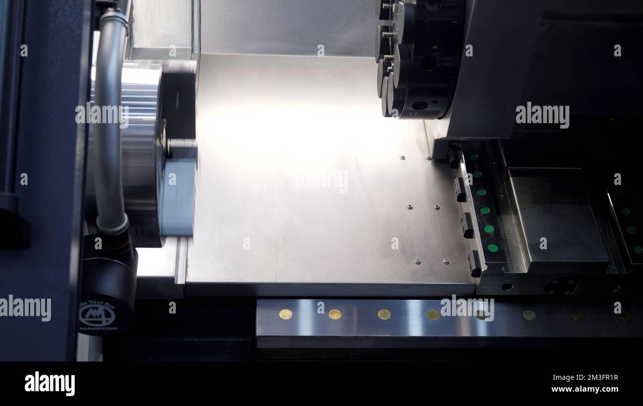 Abstract metal spinning mechanism at the industrial plant. Media ...