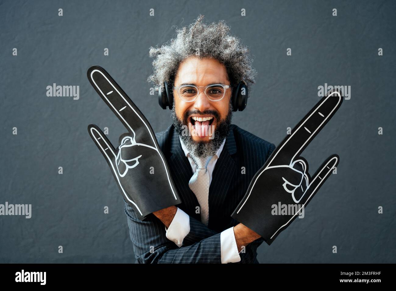 Cinematic and storytelling image of a young entrepreneur celebrating ...