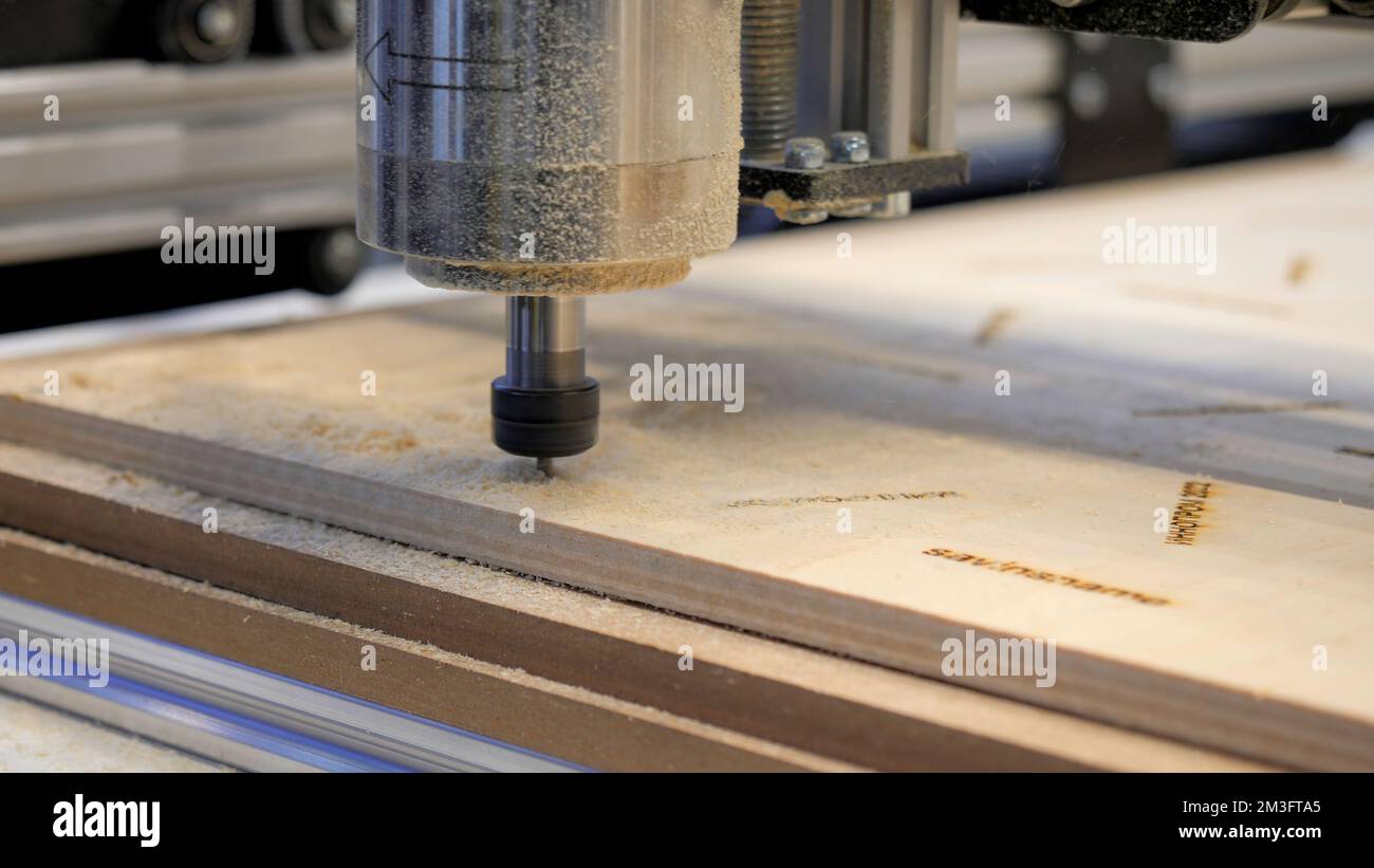 Chipboard milling automatic machine, close up. Media. Industrial ...