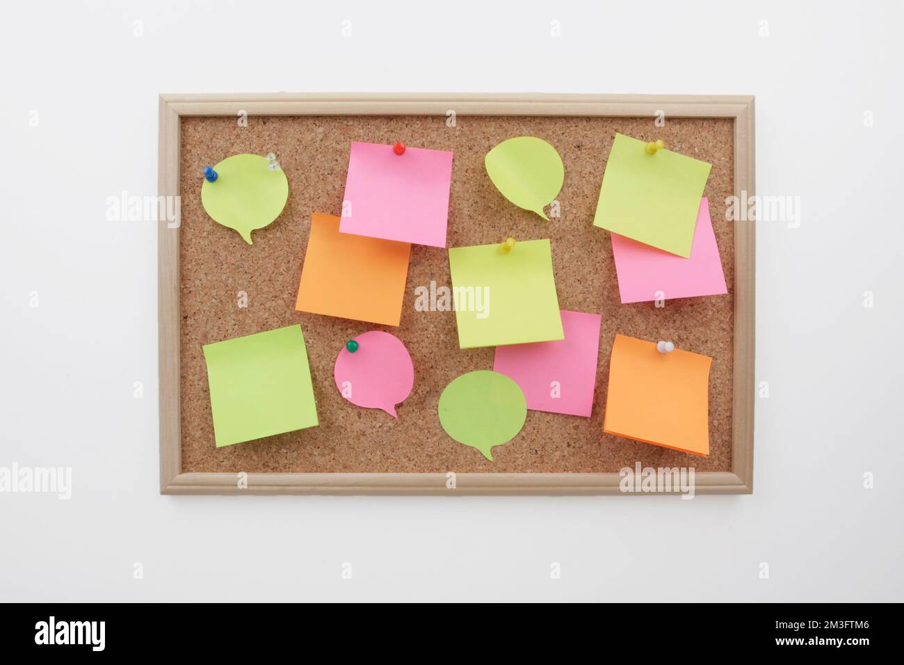 colorful post it note papers on cork board Stock Photo - Alamy